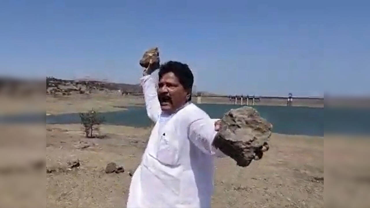NCP Leader Devram Lande Threatens to Throw Stones At Officials On Manikdoh Dam | Pune News ...