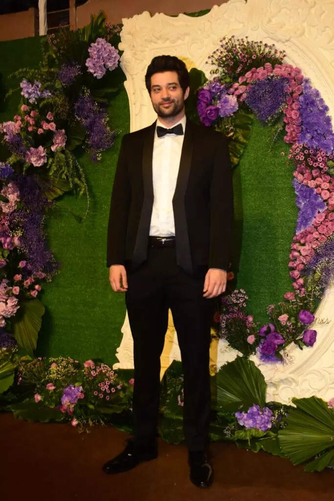 Karan Deol Drisha Acharya Reception Rajveer Deol Distributes Sweets Among Paps Salman Khan
