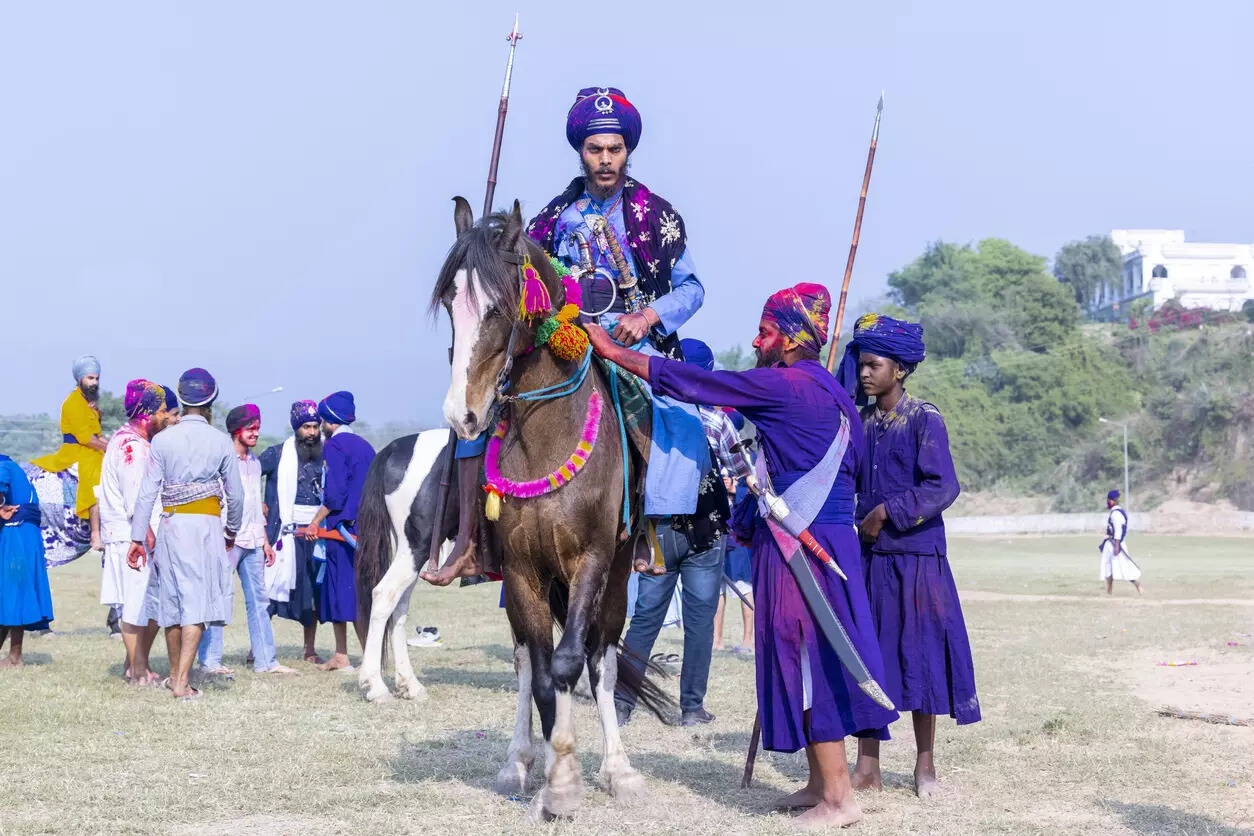 Holla Mohalla: Holi Beyond Colours: The Martial Spirit Of Holla Mohalla ...