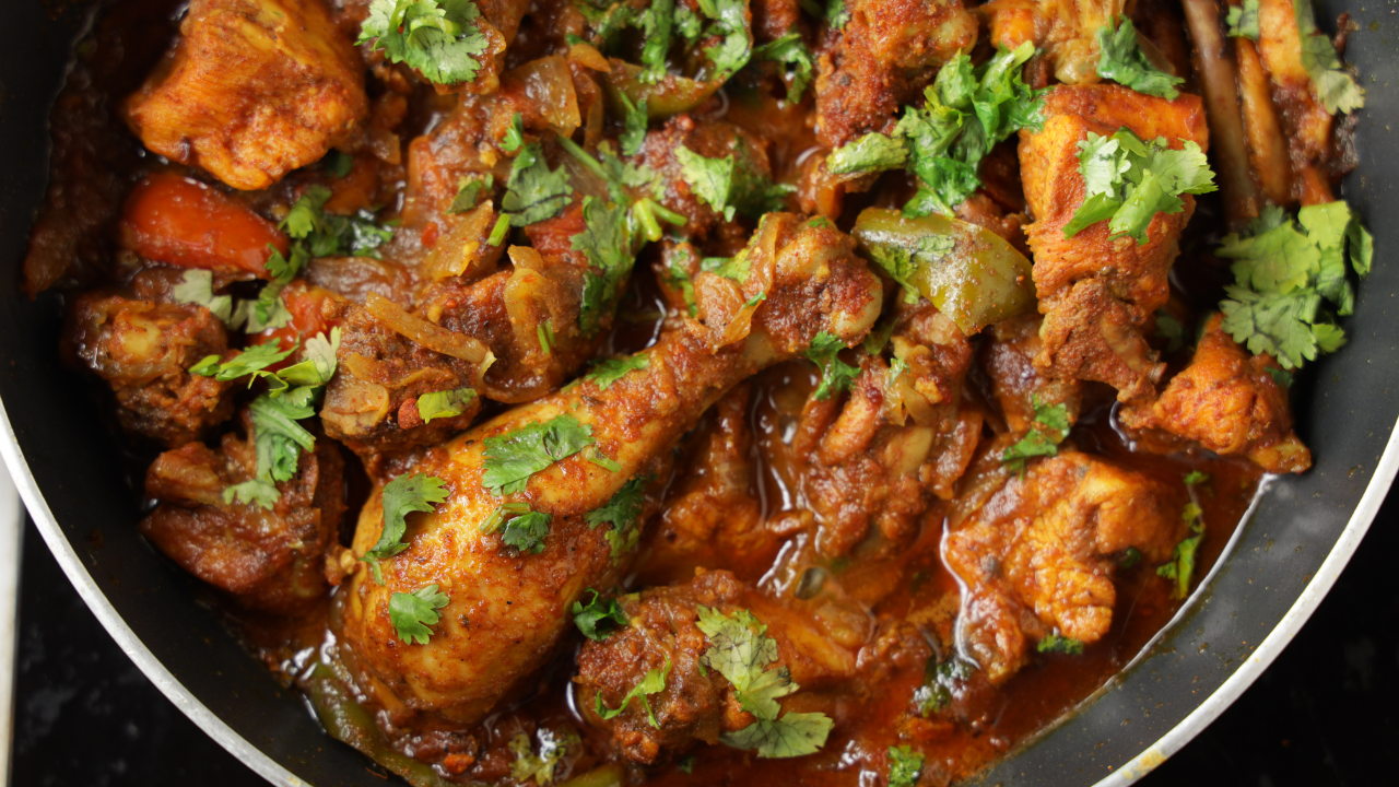 Kerala Style Nadan Kozhi Curry With Malabar Parotta For Wholesome ...