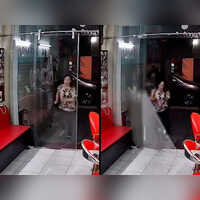 Viral video: Oblivious woman runs straight into glass door, knocks it over
