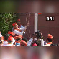 Saffron cap first worn by PM Modi becomes part of BJP workers' attire ...