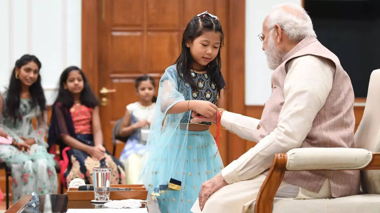 WATCH - PM Modi shares photos of 'unforgettable' Raksha Bandhan with ...
