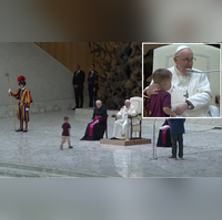 Young boy runs up to Pope Francis during weekly audience in Vatican ...