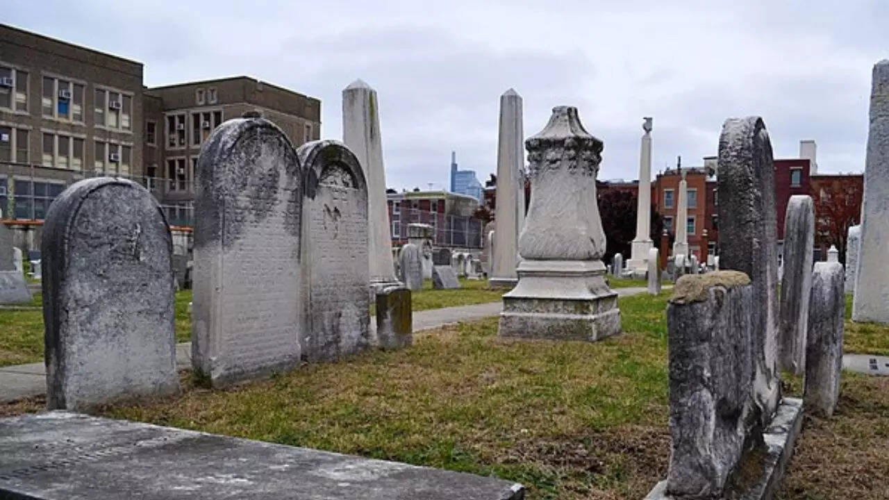 Remains of 'vampire' found with sickle on neck and padlocked toe in ...