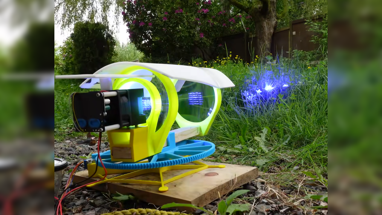 YouTuber invents stunning lawnmower robot that cuts grass with a ...