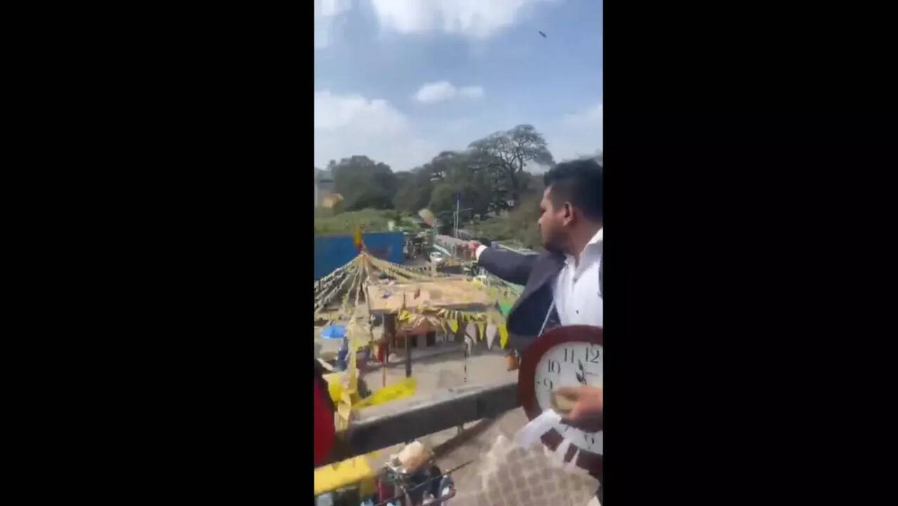 It's raining money in Bengaluru: Man throws bundle of cash from KR ...