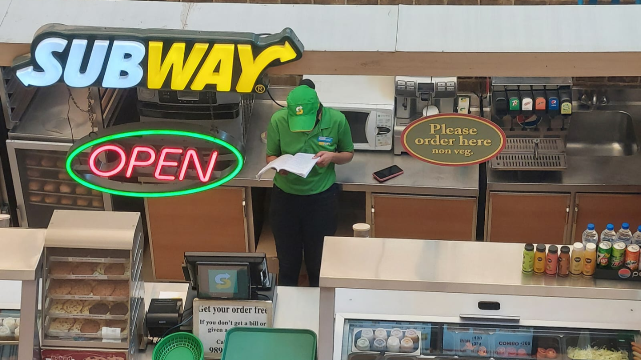 Photos of Subway employee studying at work go viral, netizens say ...