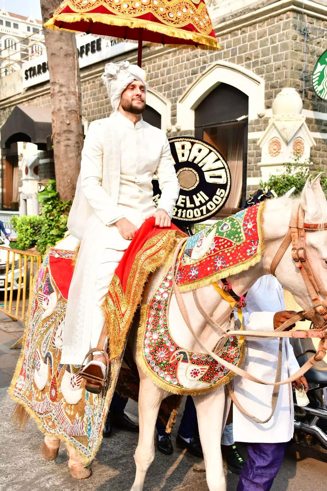 Dulha Ivor McCray dances his way to bride Alanna Panday as he reaches ...