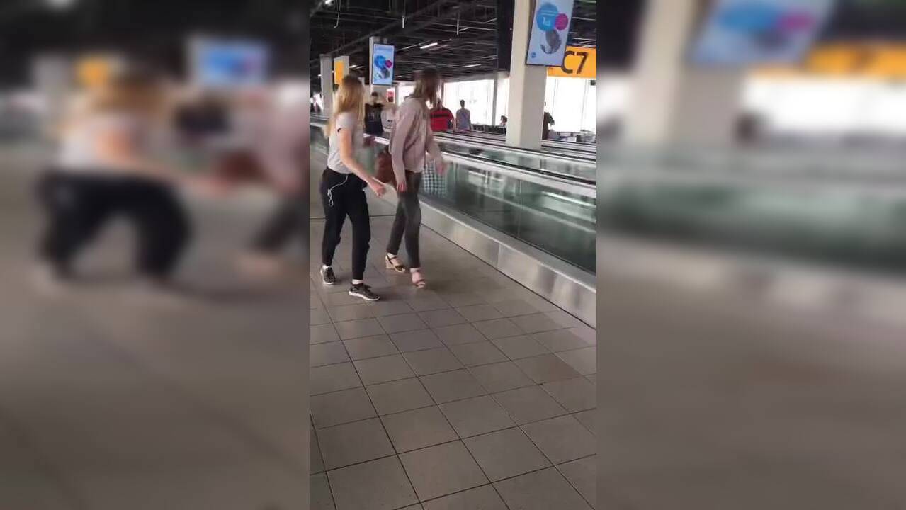 Viral Video: Group of Men Pretend to Row Boat on Moving Walkway at ...
