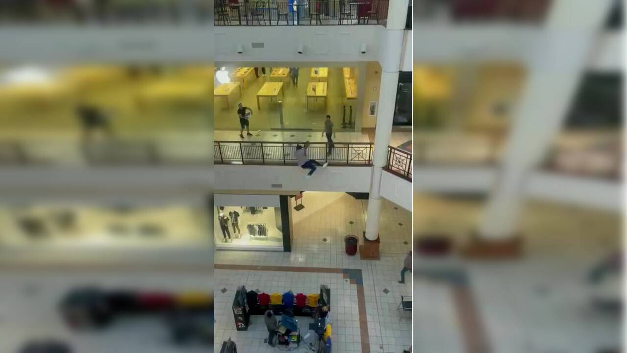 Man Jumps Off Second Floor After Robbing Apple Store - Viral Video | Times Now