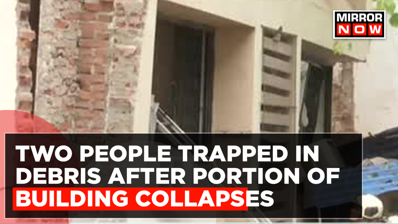 Two People Trapped In Debris After A Portion Of A Building Collapses In ...