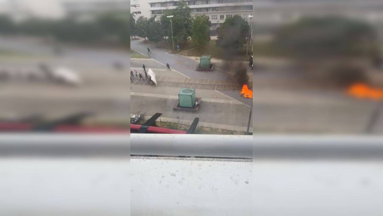 France Riots Video Shows Man Eating Sandwich As Protestors, Police ...