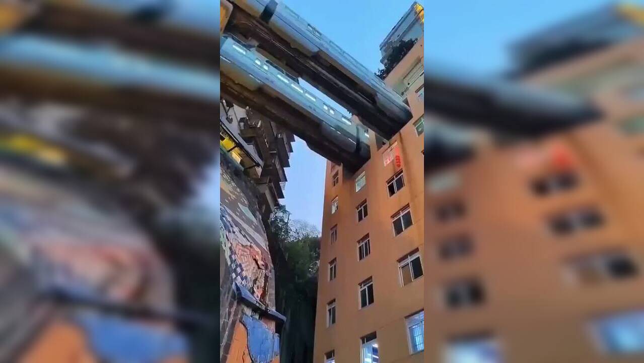 Video: Train Passes Right 19-Storey Residential Building in China ...