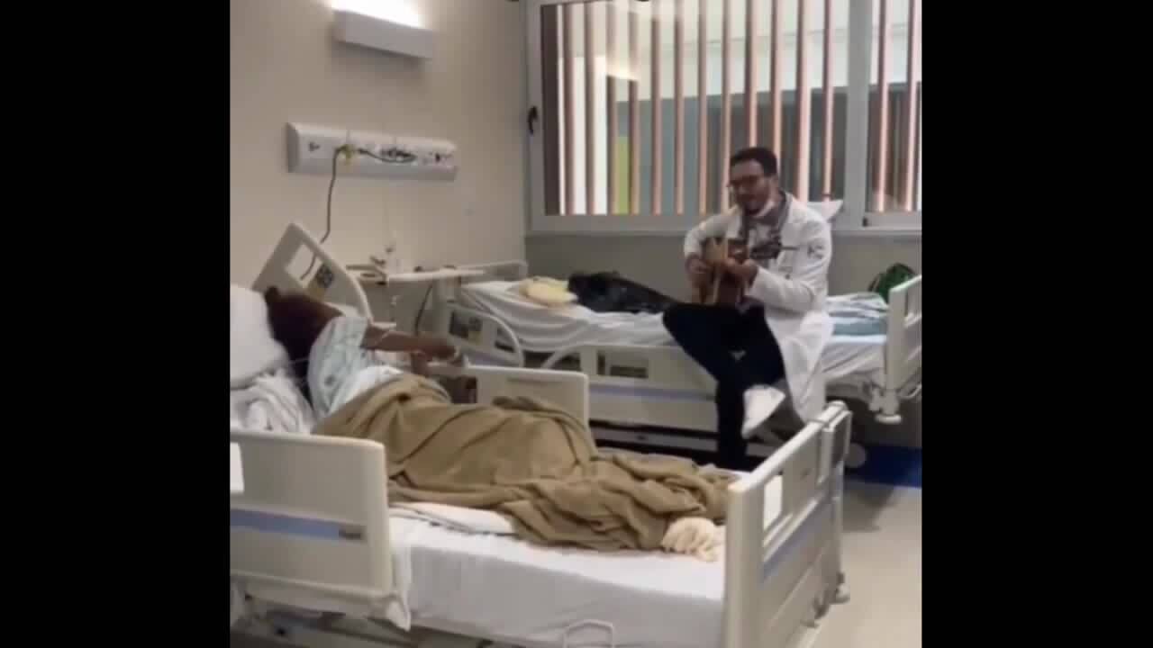 Viral Video: Doctor Sings, Plays Guitar for Patient With Severe Heart ...