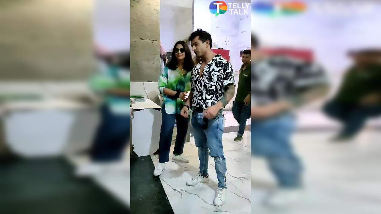 Karan Singh Grover happily POSES with wife Bipasha Basu as they get ...