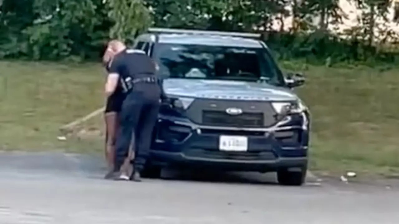 Maryland Police Officer Caught Kissing Woman Suspended After Viral ...