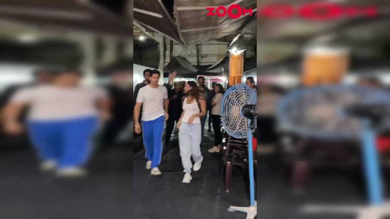 Sidharth Malhotra & Kiara Advani BRIEFLY poses for the paps as they get ...