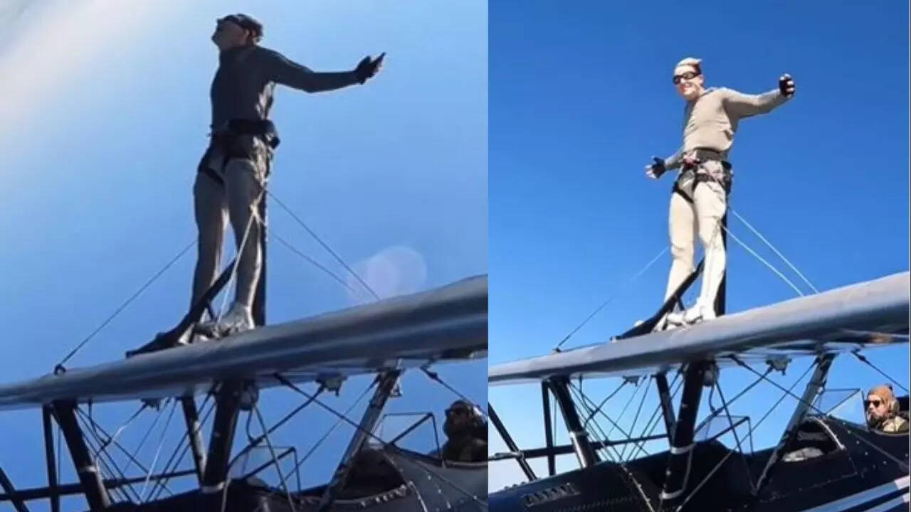 Viral Video: Man Stands Atop Moving Plane In Shocking Clip | Watch ...