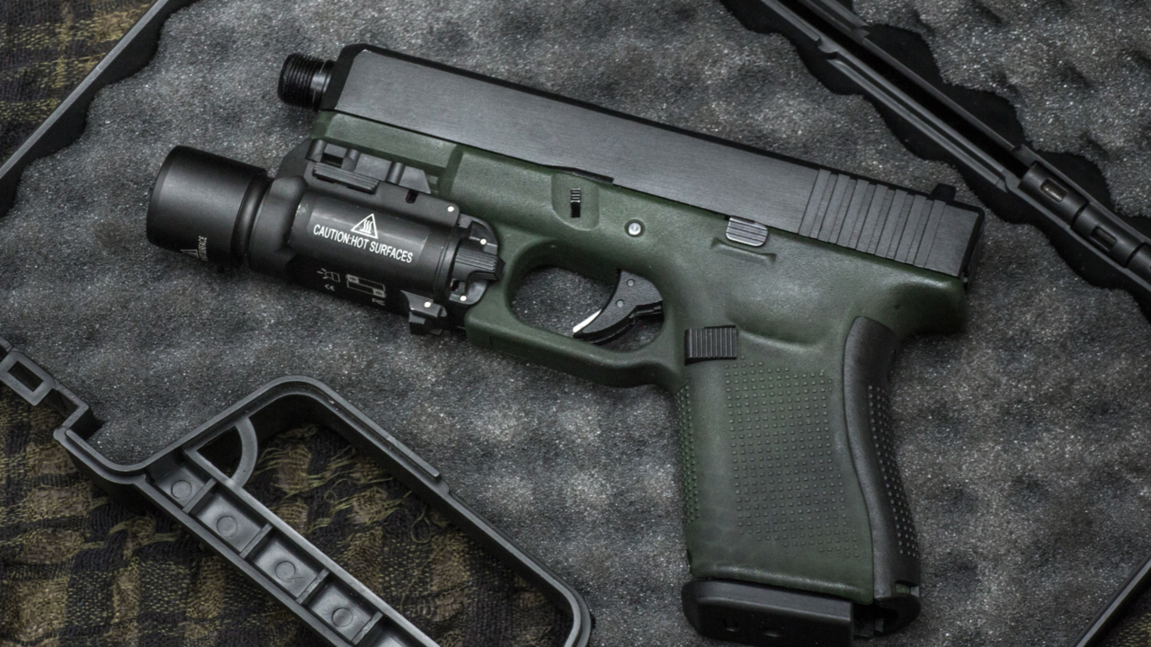 Dentist Offers Free Gun to Patients Seeking Invisalign Treatment ...