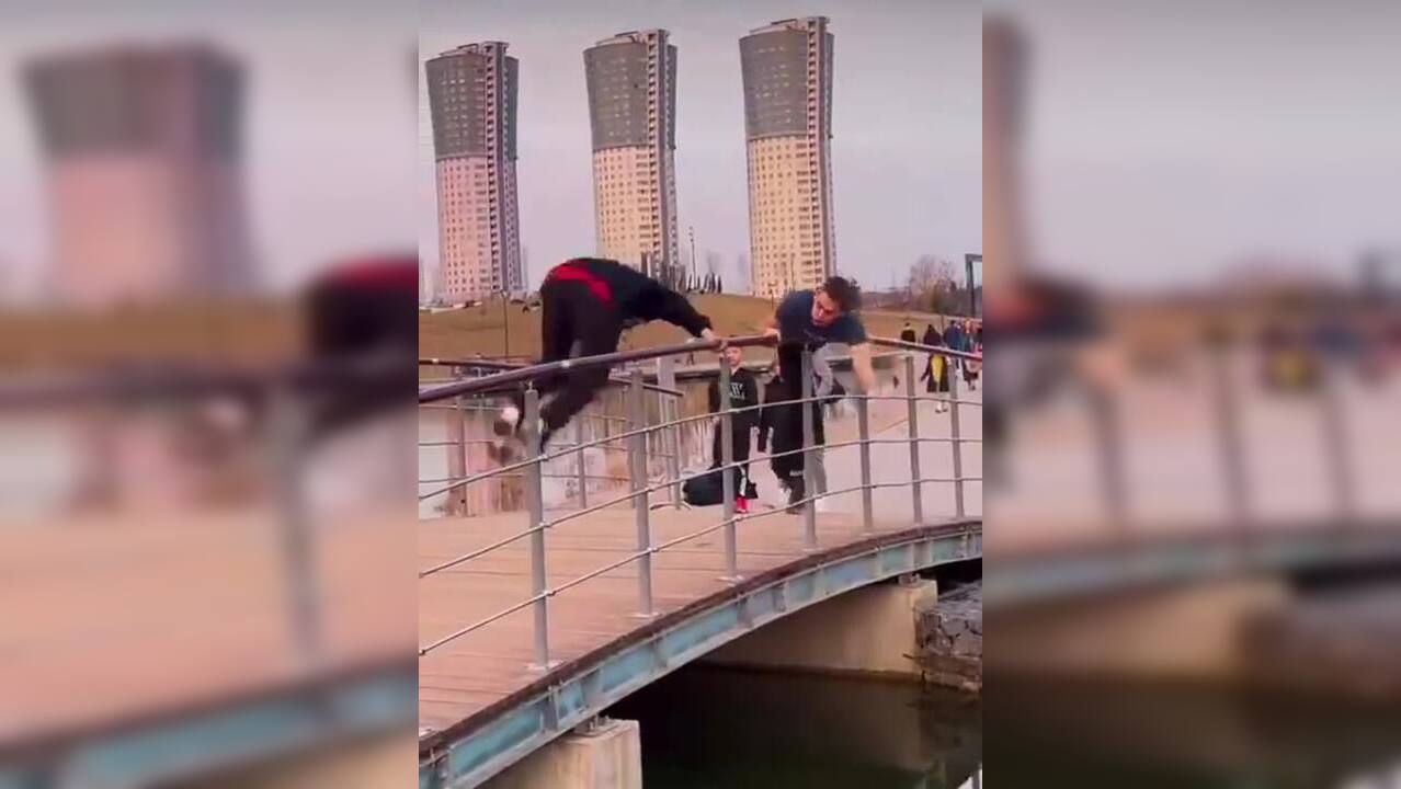 Viral Video: Brave Bystander Leaps into Action to Rescue Bridge ...