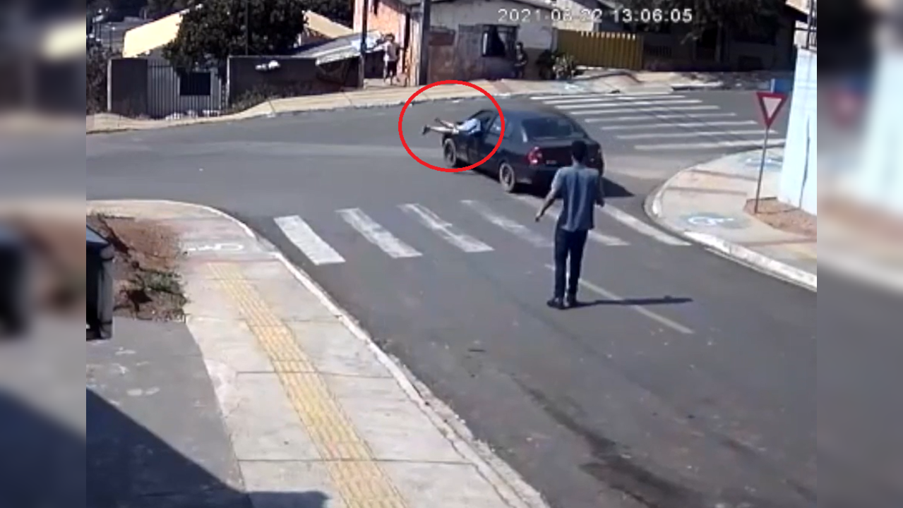 WATCH VIDEO | Man jumps through window of a moving car to stop it from ...