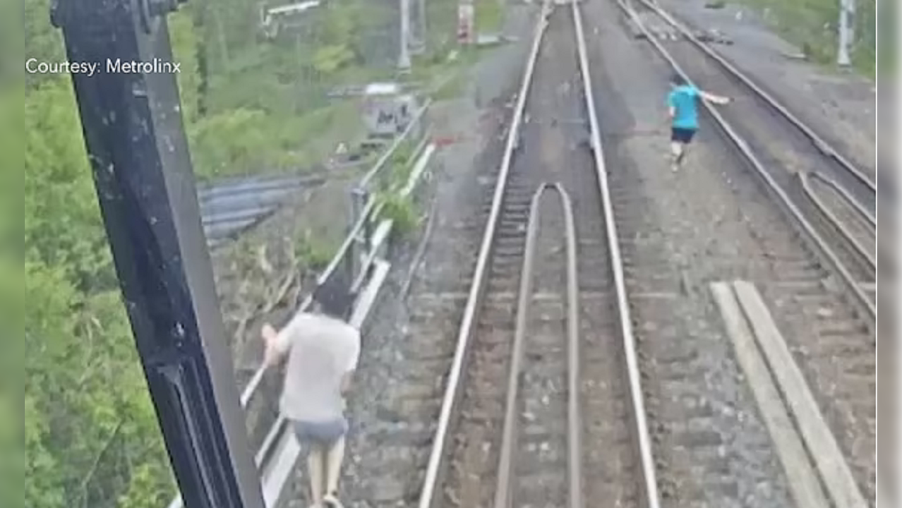 Three kids narrowly dodge death after racing on railway track; heart ...