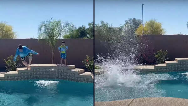Viral video: Mom teaching son how to jump into pool hilariously falls ...