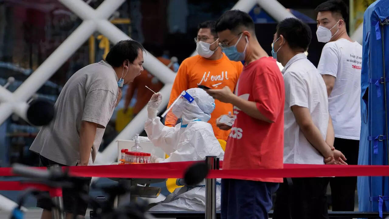 China: After banking protests, Covid app 'restricts' residents from ...