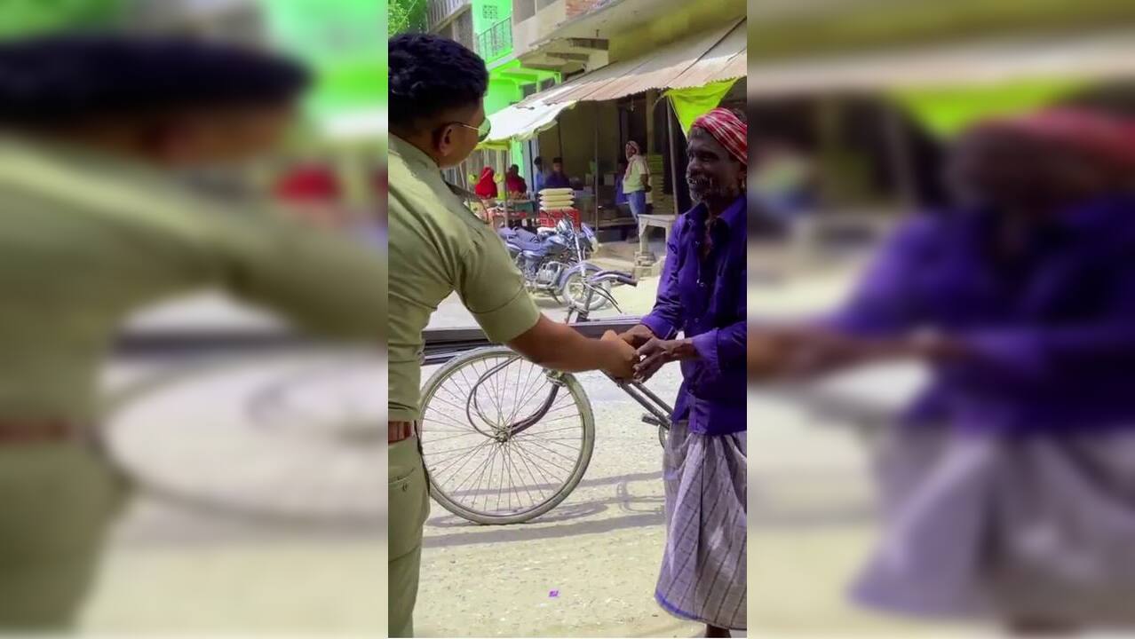 Viral video: UP cop gives pair of new slippers to cart-puller walking ...
