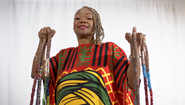 Woman with 42-feet inch fingernails earns two Guinness World Records ...