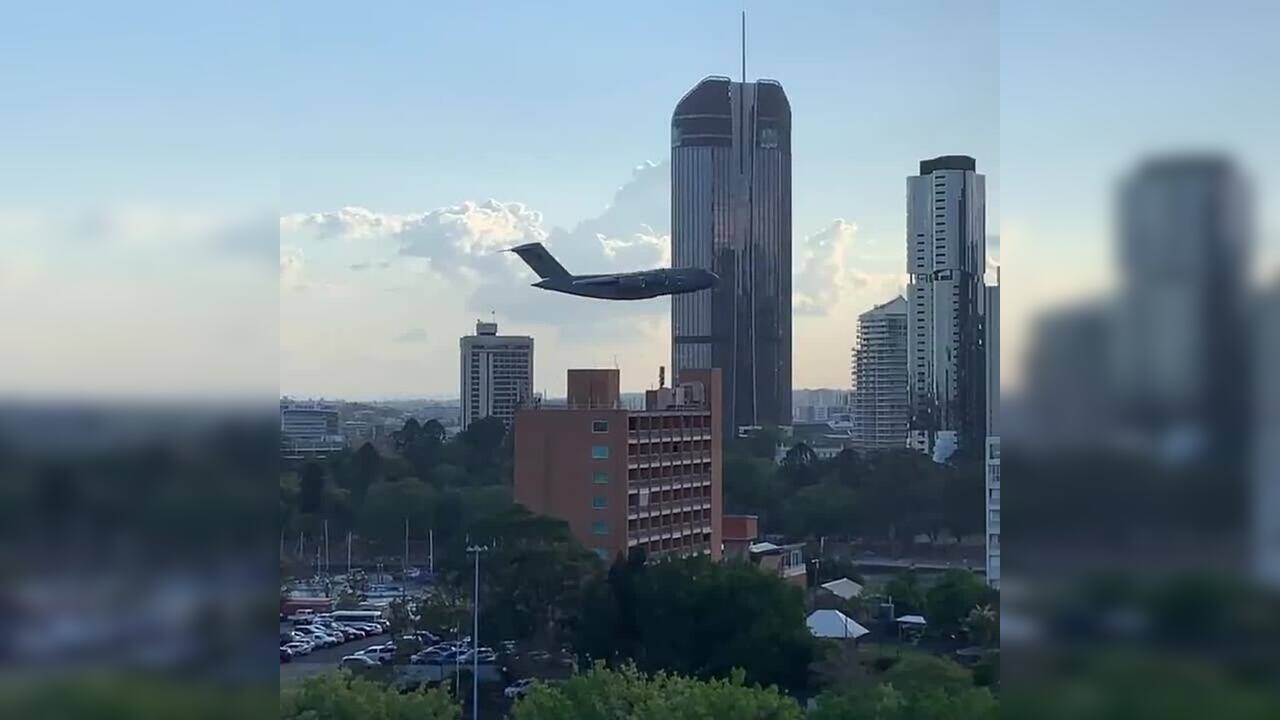 Viral video: Globemaster plane flies astonishingly low between ...