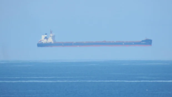 Ship floating in air| Is this ship floating in mid-air? Viral video ...