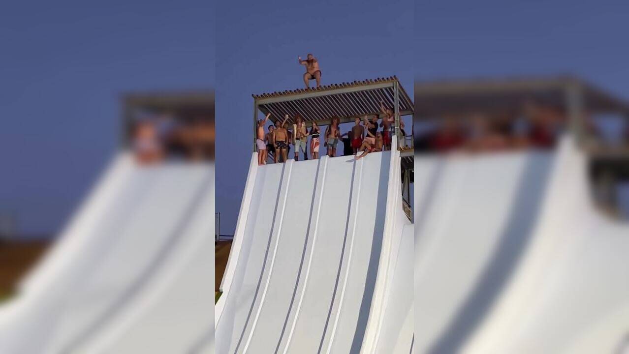 Viral video: Man jumps onto waterslide, shoots up in air before ...