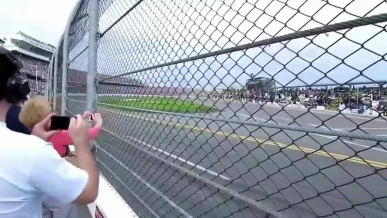 Viral video: Race cars move swiftly causing spectators to almost fall ...