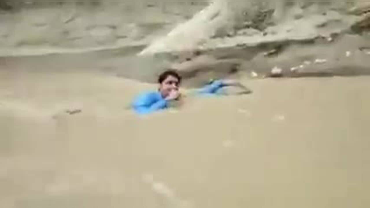 Viral video: Journalist gives flood updates in neck-deep water ...