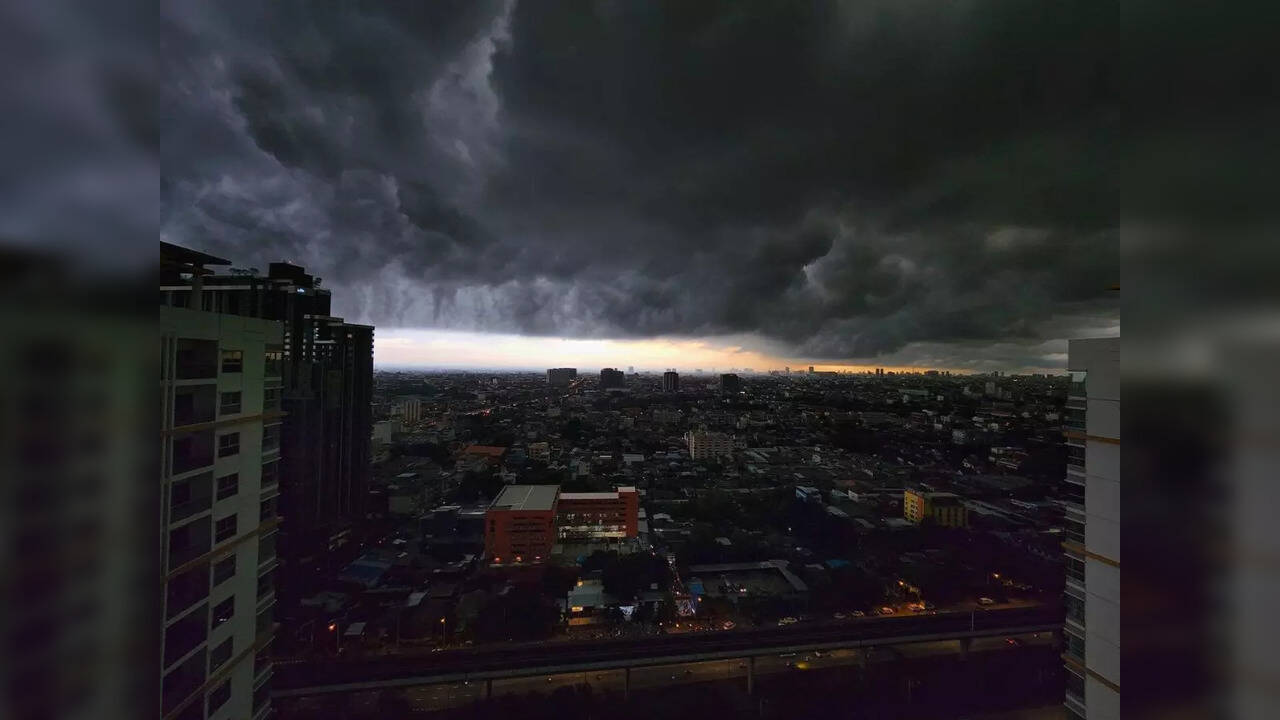Dark, dense, doomsday-esque clouds hanging in sky over Thailand raise ...