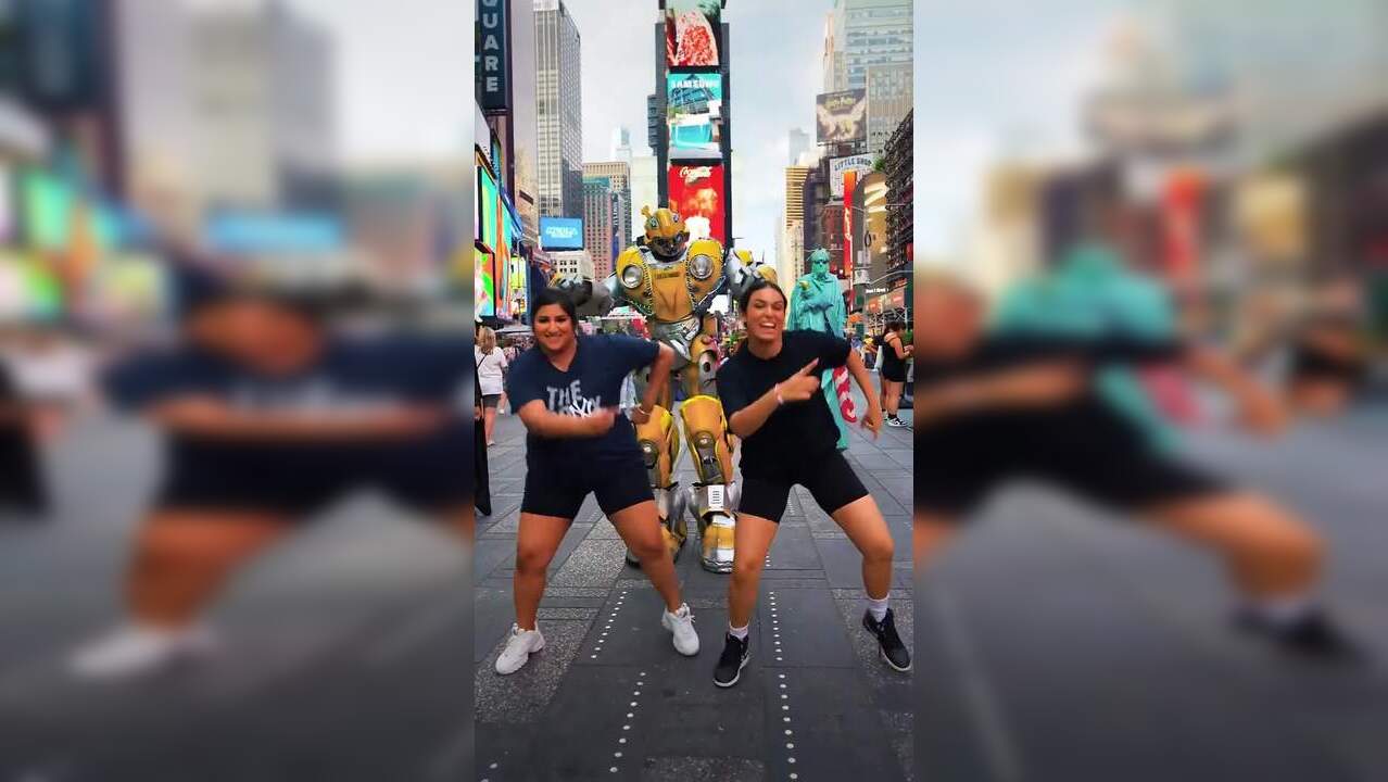 Viral video: Indian girls do bhangra with Bumblebee robot at Times ...