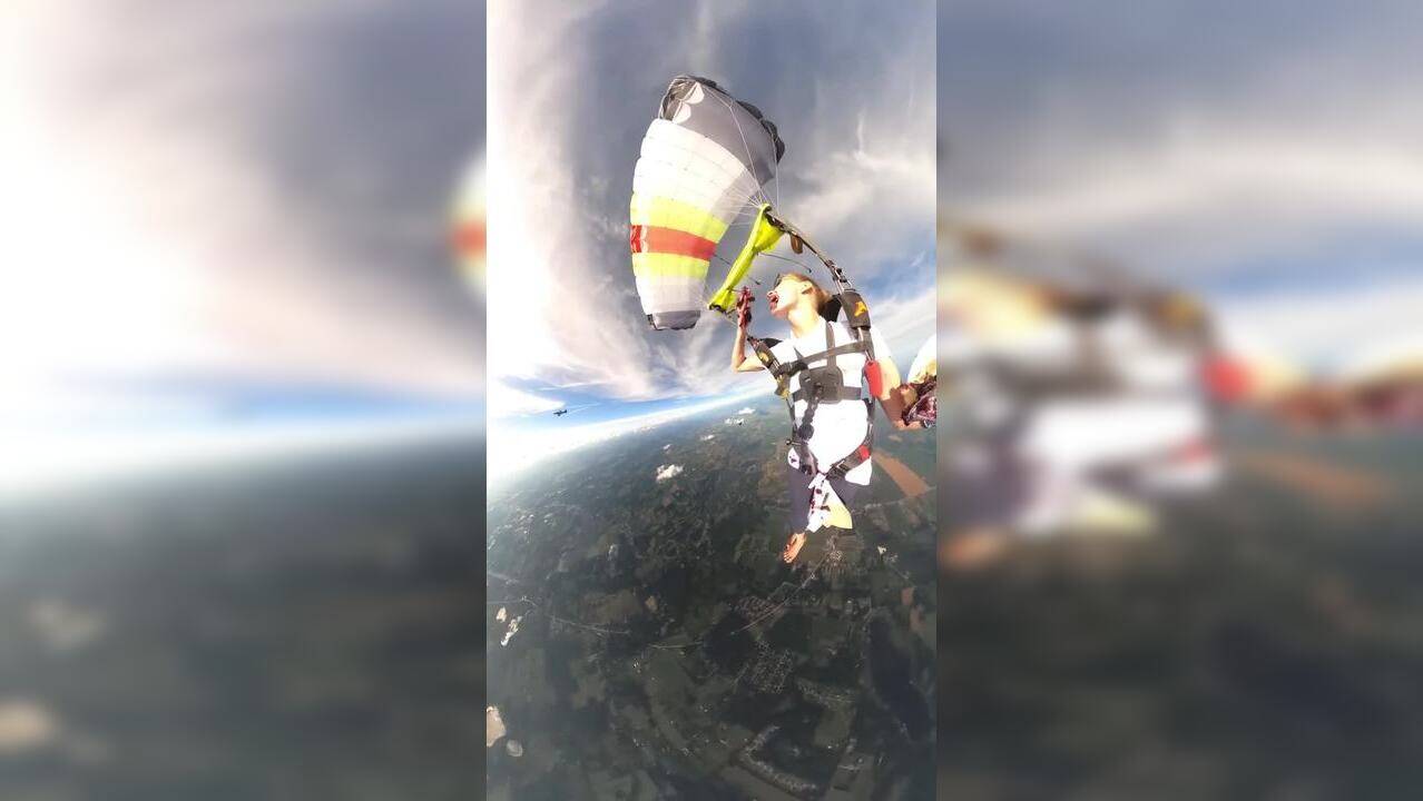Influencer eats pie while skydiving to promote local restaurant; clip ...