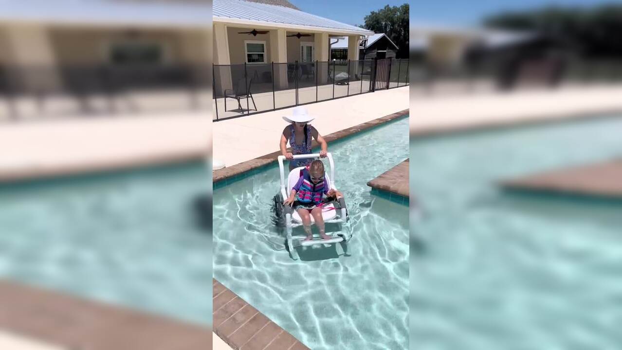 Specially-abled girl enjoys wheelchair-accessible pool for the first ...