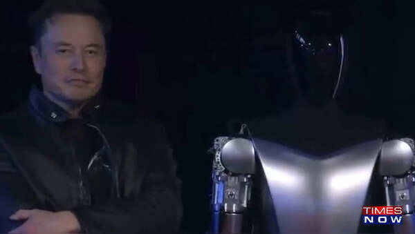 Elon Musk Unveils Tesla Bot Says There Will Also Be A Cat Girl