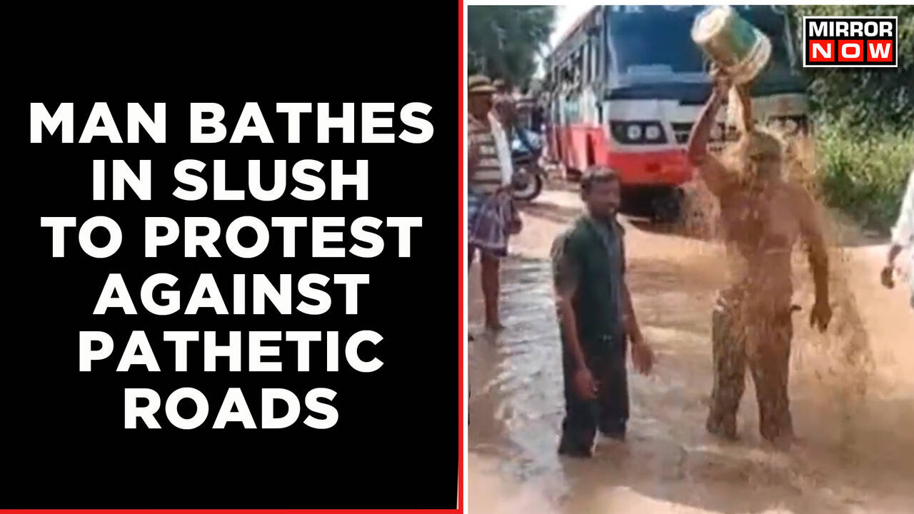 Karnataka Civic Apathy Locals Protest Against Potholes By Taking Bath