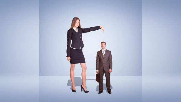 Being the giraffe in the room may backfire – study says tall people ...