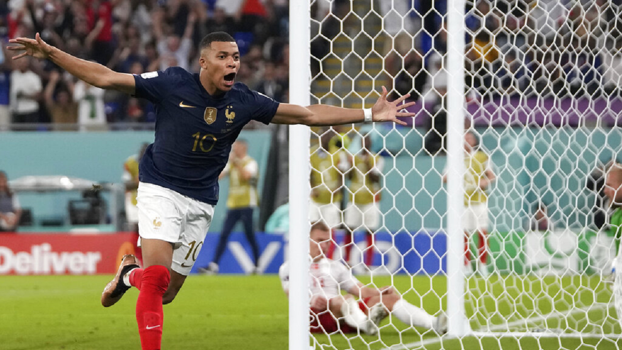 Kylian Mbappe double puts holders France into World Cup last 16