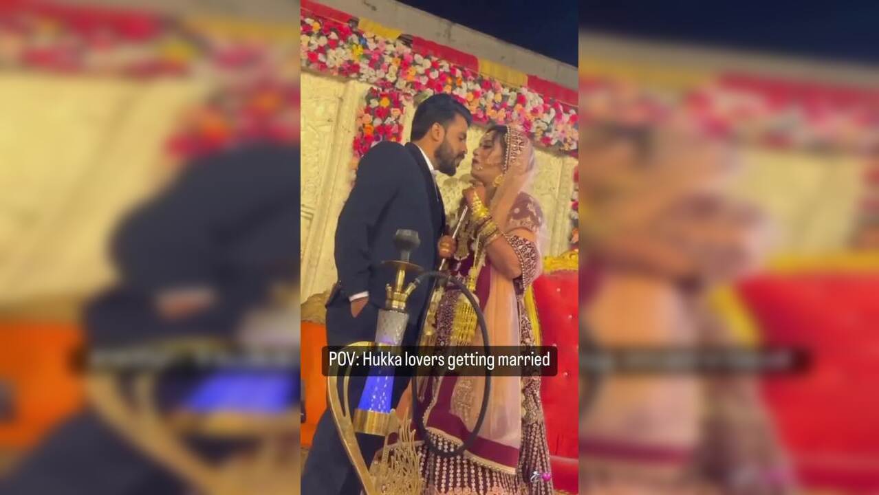 Viral video: Bride's smoky kiss for groom while doing hookah | Times Now