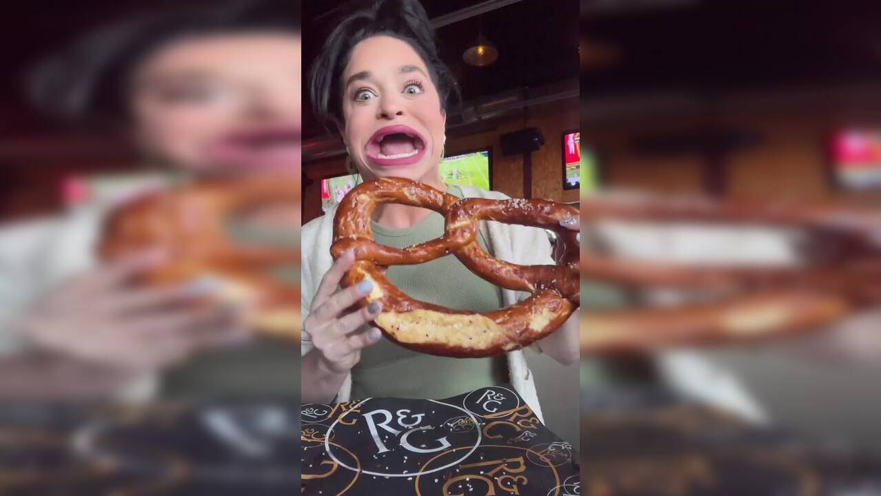 Viral video: Woman with world's largest mouth gape fits entire pretzel ...