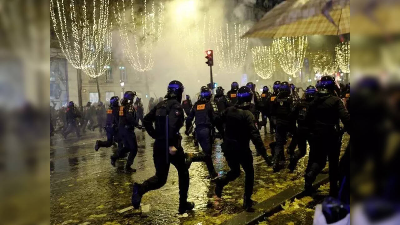 Riots break out in Paris after France loses to Argentina in FIFA World ...