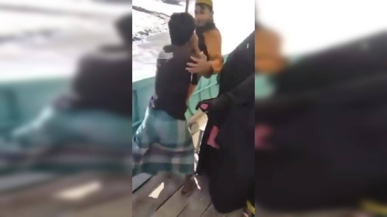 Viral video: Two men nearly fall off boat while fighting as Udit ...