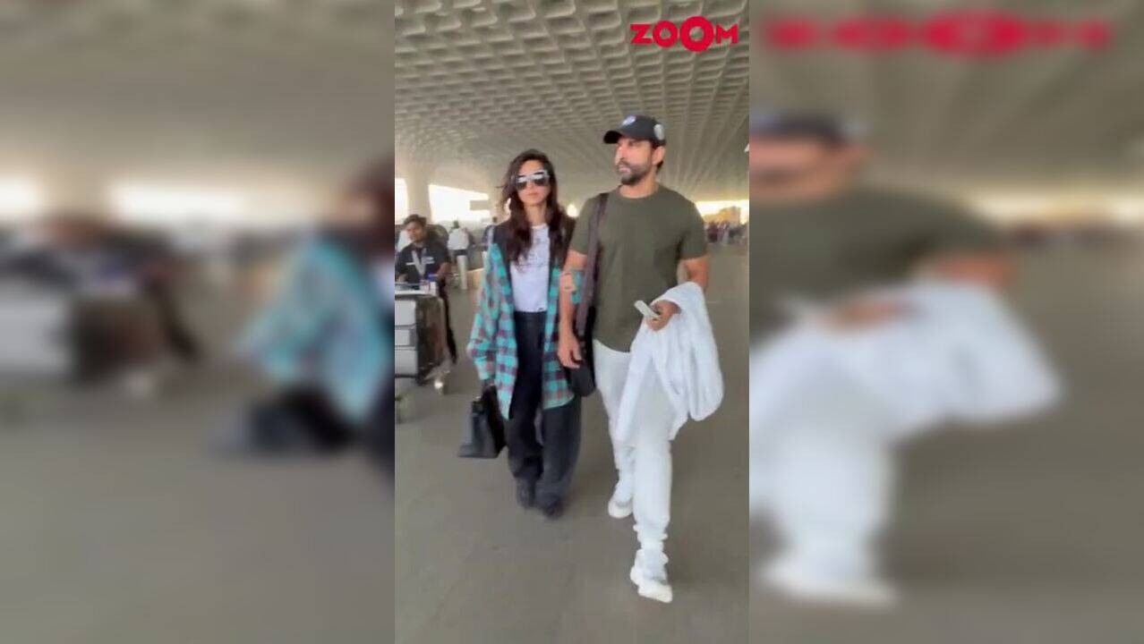 Farhan Akhtar & Shibani Dandekar walk hand-in-hand at the airport