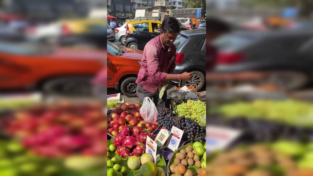 WATCH: Anand Mahindra buys fruit from roadside vendor using RBI's e ...